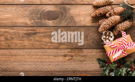 Christmas gift box with big cones Stock Photo - Alamy