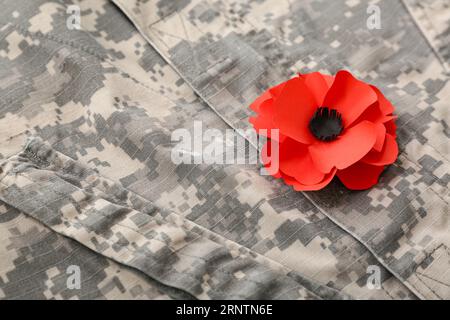 Poppy flower on military uniform, closeup. Remembrance Day in Canada ...