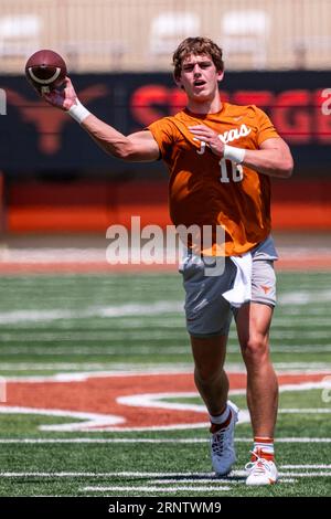 Sept 2, 2023. Arch Manning #16 of the Texas Longhorns warming up before ...