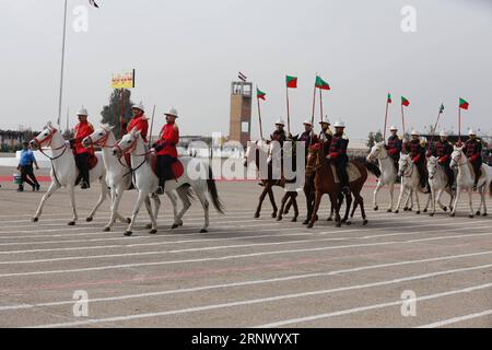 Iraqi army soldiers take part in a parade during a ceremony marking the ...