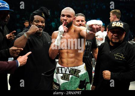 Boxing trainer Brian McIntyre (centre) leaves Manchester Crown Court ...