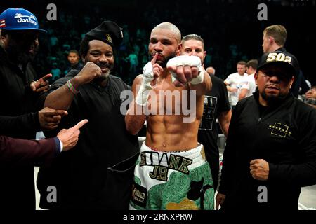 Trainer Brian Smith celebrates victory with owners after their horse ...