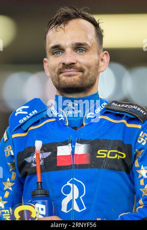 Bartosz Zmarzlik of Poland #95 celebrates on the podium with Michael ...