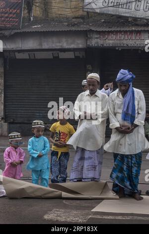 Muslims offer Eid al-Fitr prayers in Gauhati, India, Tuesday, May 3 ...
