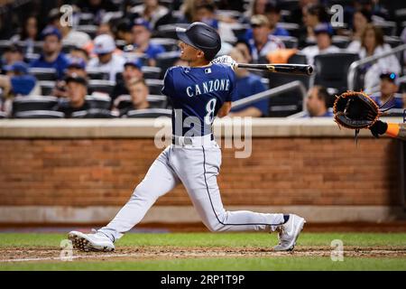 Seattle Mariners right fielder Dominic Canzone dives in vain for a ...