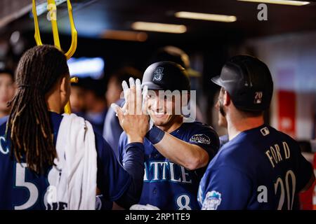 Seattle Mariners right fielder Dominic Canzone catches a long fly ball ...