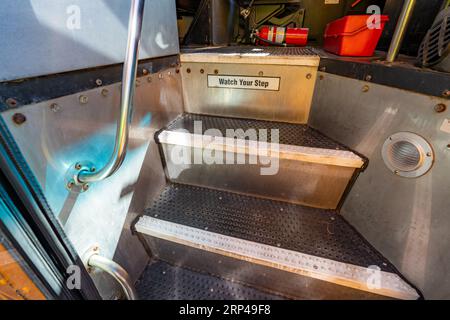 steps Interior, inside, of a american school bus Stock Photo - Alamy