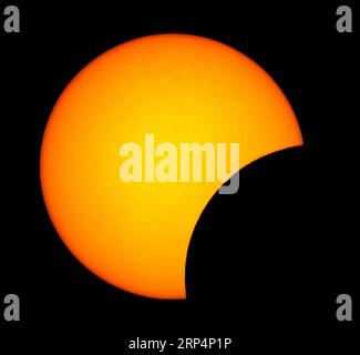 Partial solar eclipse taken in 2020 Stock Photo - Alamy