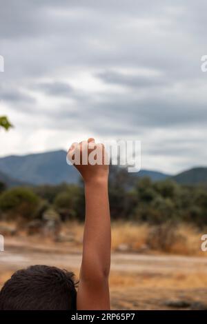 Child's hand making different shapes, either raising a finger, raising ...