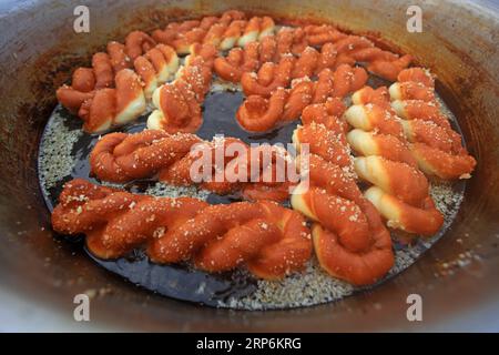 Mahua, a traditional Chinese food is fried in oil, North China Stock ...