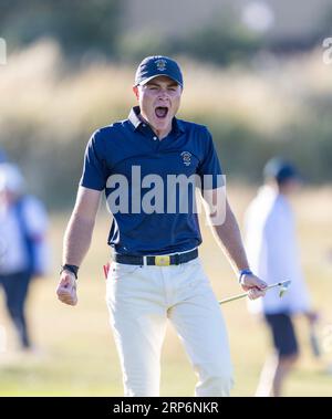 Austin Greaser of the USA on the 17th green as USA win the tournament ...