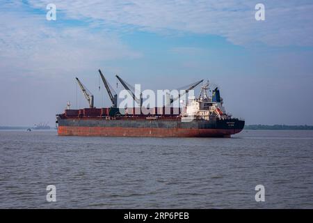 A foreign vessel anchored on the Pashur River on the outer anchorage of ...