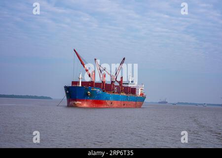 A foreign vessel anchored on the Pashur River on the outer anchorage of ...