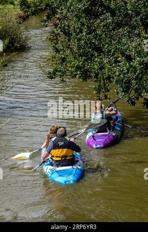 Kayakers, paddlers, and canoeists on Lake Baldeney near Essen ...