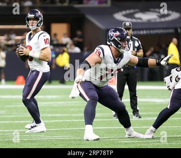 Houston Texans quarterback Davis Mills (10) is sacked by Buffalo Bills ...