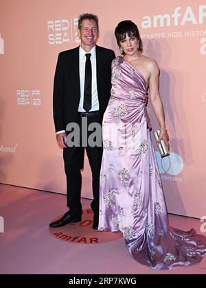 Milla Jovovich & Paul W.S. Anderson attending the Saint Laurent event ...