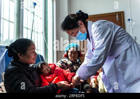 The doctor gives the child an injection in the buttock. Selective focus ...