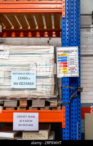 Safety recommendations sign attached to metal racking Stock Photo - Alamy