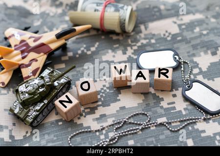 word Ukraine laid out on table of fallen yellow autumn leaves ...