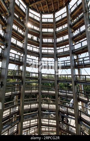 visitors walking inside the 40-meter-high observation tower, part of ...