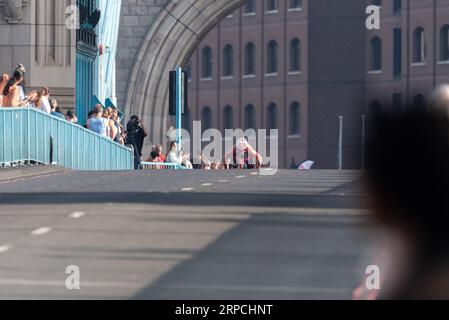 Mel Nicholls competing in The Big Half wheelchair race, half marathon ...