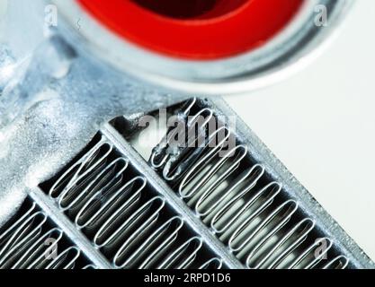Damaged car heater core. Damaged honeycombs on an aluminum car radiator ...
