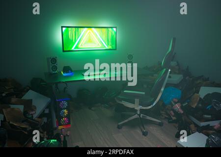 Depressing image with a messy gaming room. Cluttered gamer's room ...