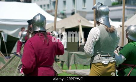 Guardians of the Past, Soldiers Poised with Spears at Reenactment ...