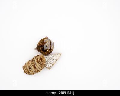 Three varieties of pure ghee sweets from India, each with its own ...