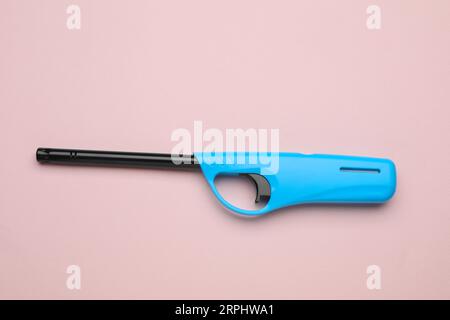 One gas lighter on beige background, top view Stock Photo - Alamy