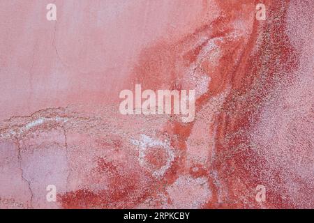 Damp stains on a red wall. Home damage and renovation Stock Photo - Alamy