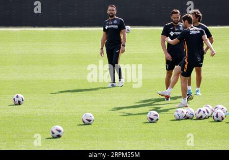 Getafe's head coach Jose Bordalas directs his players next to Barcelona ...