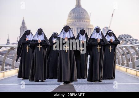 Seven demonic nuns descend on London's Millennium Bridge to celebrate ...