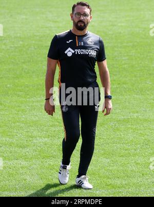 Getafe's head coach Jose Bordalas directs his players next to Barcelona ...