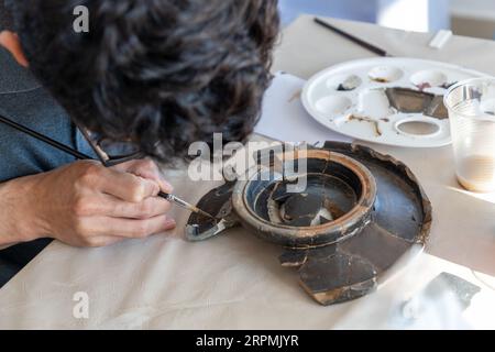 Restoration stage of a ceramic vessel Stock Photo - Alamy
