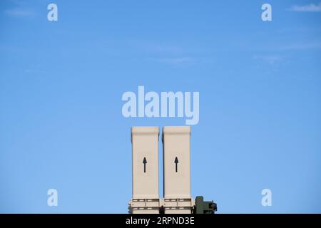 Panker, Germany. 05th Sep, 2023. A female soldier walks past a sticker ...