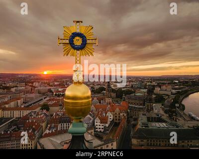 Aerial view of a town with domed church towers and mountains in the ...