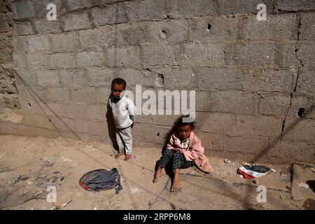 200312 -- YEMEN, March 12, 2020 Xinhua -- A Yemeni girl stands outside ...