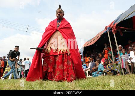 Living incarnation of Sàngó, leads the faithful to perform one of the ...