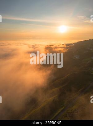 An inversion observed from the Howth Cliff Walk with fog all over ...