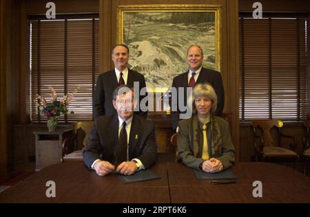 Utah Governor Mike Leavitt, seated left, and Secretary Gale Norton ...