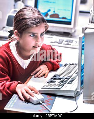 1990’s School Junior Computer Class multiethnic junior school students ...
