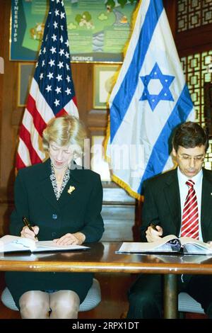 Secretary Gale Norton, seated left, and Israel's Ambassador to the U.S ...
