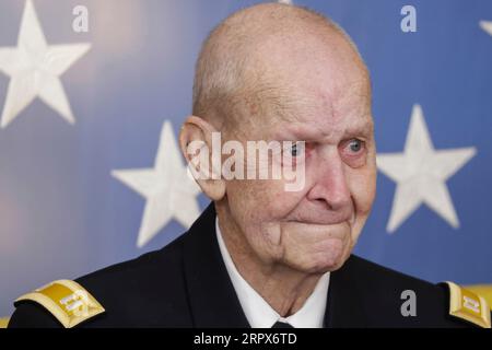 United States Army Captain Larry Taylor leaves the East Room after ...