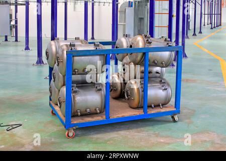 Stainless steel pressure tank piling up together, closeup of photo ...