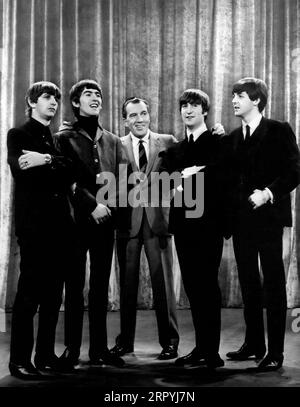 The Beatles appearing with Ed Sullivan in the United States on the Ed ...