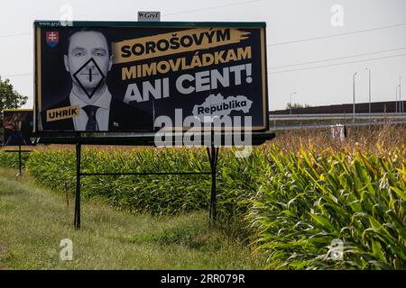 Bratislava, Slovakia. 27th Aug, 2023. Car drives by the election ...