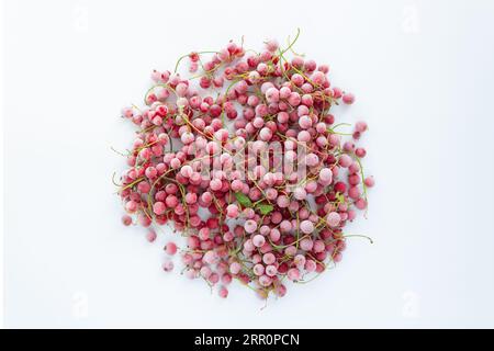 Red frozen currant berries isolated on white Stock Photo - Alamy