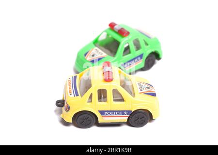 toy police cars isolated on white background Stock Photo - Alamy