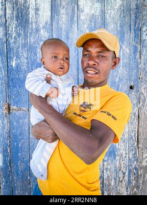 Madagascar, Ambatomilo, father and son Stock Photo - Alamy